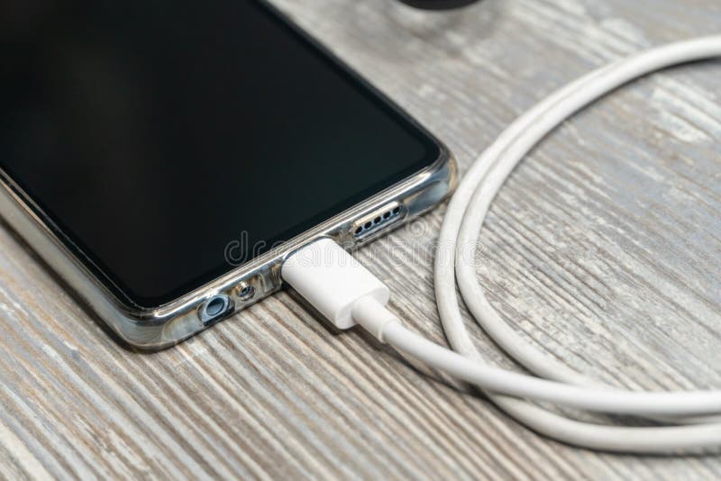 USB Cable with Smartphone on Wood Table Stock Image - Image of internet ...