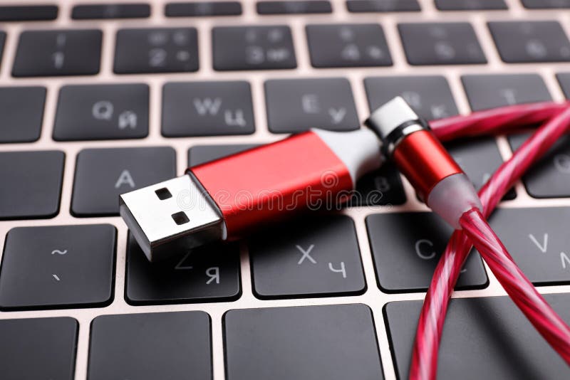 USB Cable with Type C Connector on Laptop Keyboard, Closeup Stock Image ...