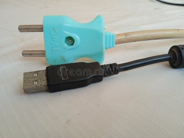 Usb Cable Wire and Power Switch Lying on a White Table Stock Image ...