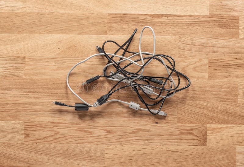 USB Cables on a Wooden Table Stock Photo - Image of light, cable: 182473406
