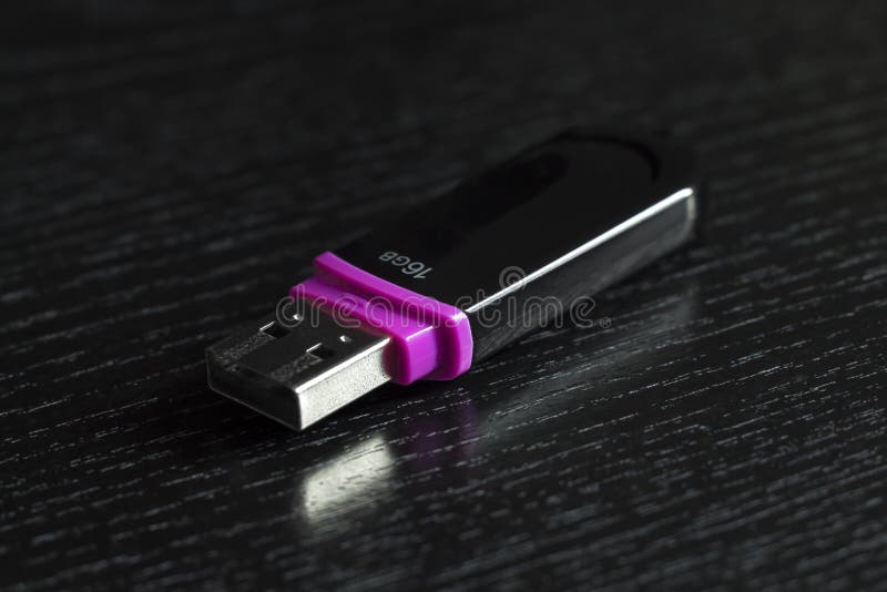 USB Flash Drive on a Black Office Desk Stock Photo - Image of black ...