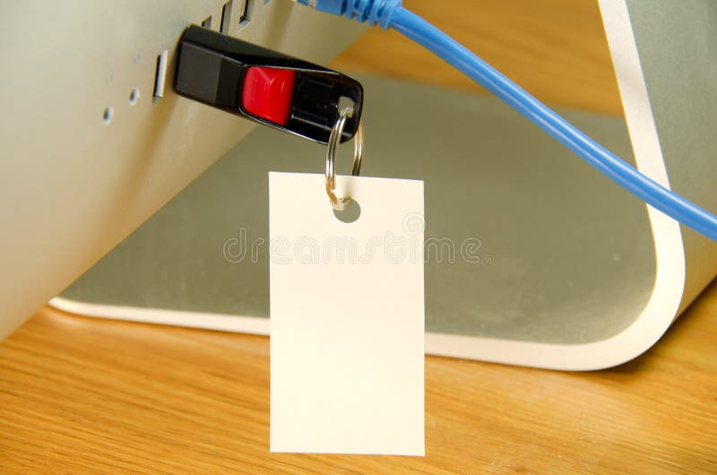 USB Flash Drive with a Card in Computer Stock Photo - Image of ring ...