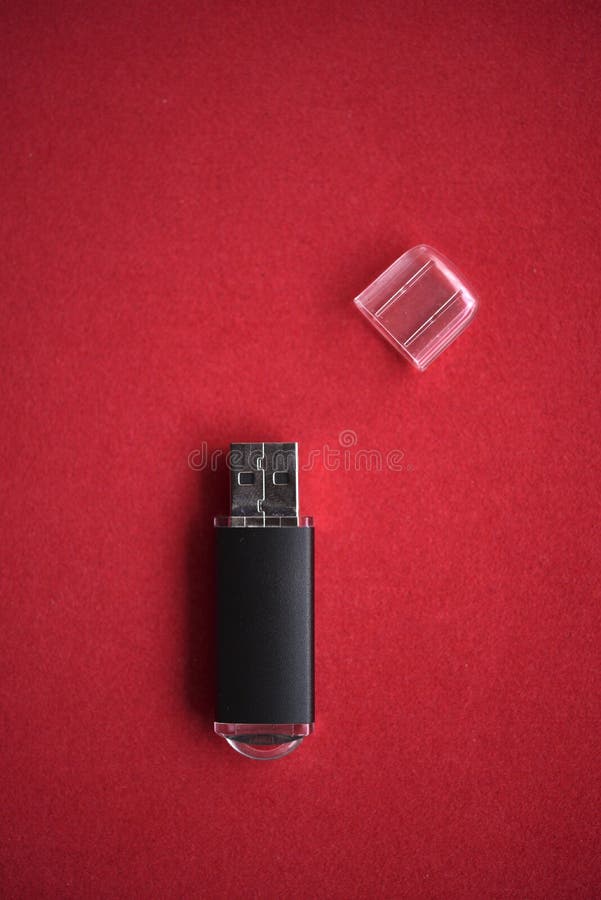 USB Flash Drive Close-up on a Red Background. One USB Flash Drive with ...
