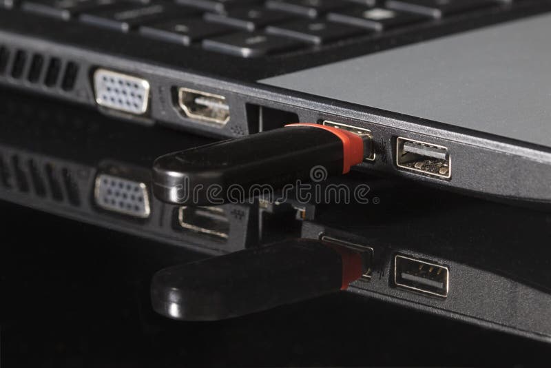 USB Flash Drive on Computer Laptop on Black Stock Photo - Image of plug ...
