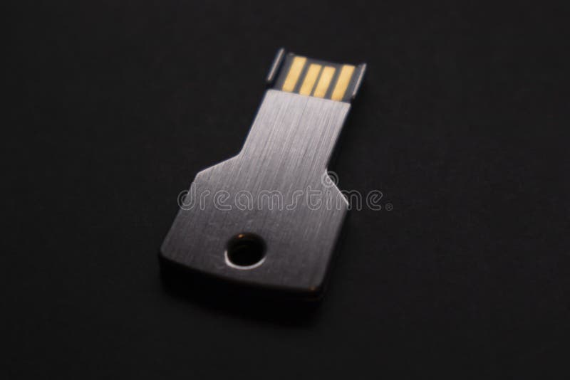 USB Flash Drive in the Form of a Key that Symbolizes Data Security ...