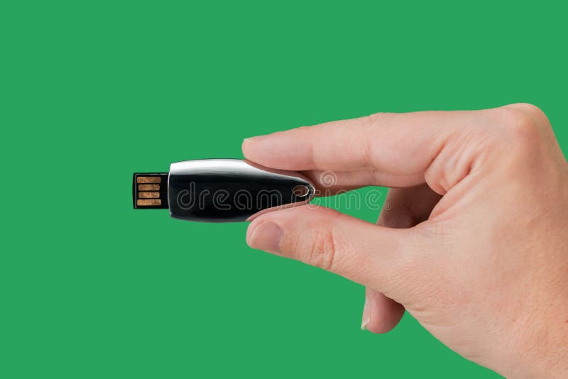 USB Flash Drive on Hand with Isolated Green Background Stock Photo ...