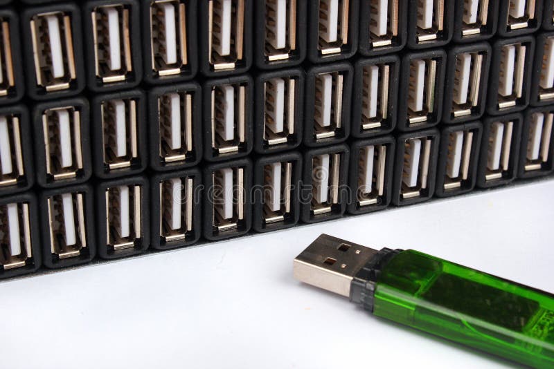 A USB Flash Drive and Many Sockets Stock Photo - Image of connector ...