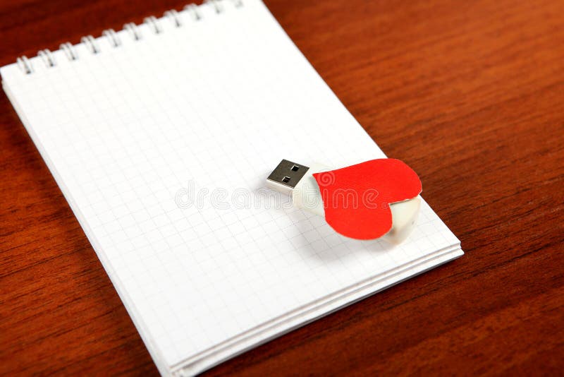 USB Flash Drive on the Note Pad Stock Image - Image of background, love ...