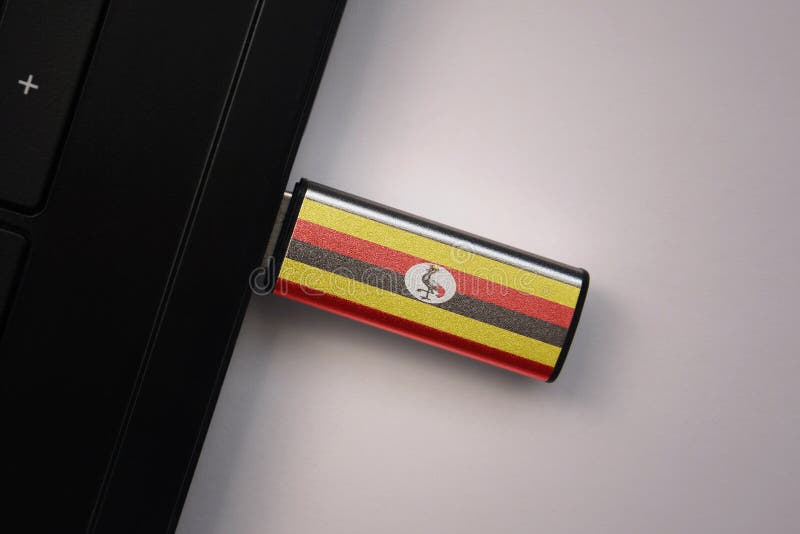 Usb Flash Drive in Notebook Computer with the National Flag of Uganda ...