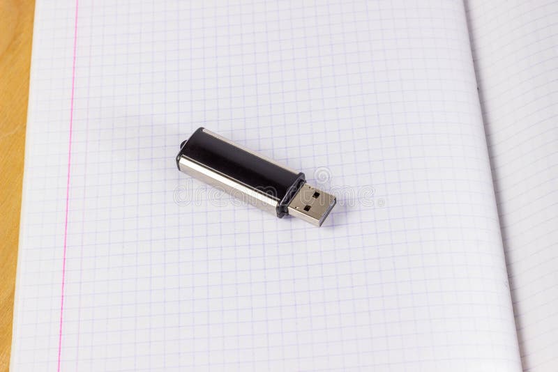 USB Flash Drive on a Sheet in a Cage Stock Image - Image of compact ...