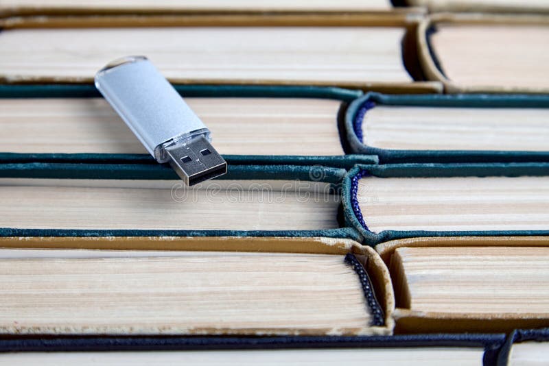 Usb Flash Drive on Stack of Paper Old Books. Keepers and Carriers of ...