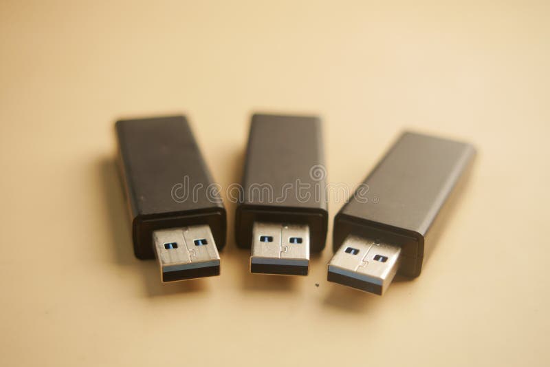 USB Flash Drives Arranged Neatly on a Beige Surface Stock Image - Image ...