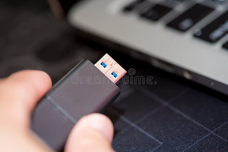 USB Flash Memory Drive Plugged into a Computer Laptop Port. Stock Photo ...