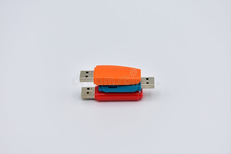 USB Flash Memory Drives with Colours, Orange, Blue and Red, on a White ...