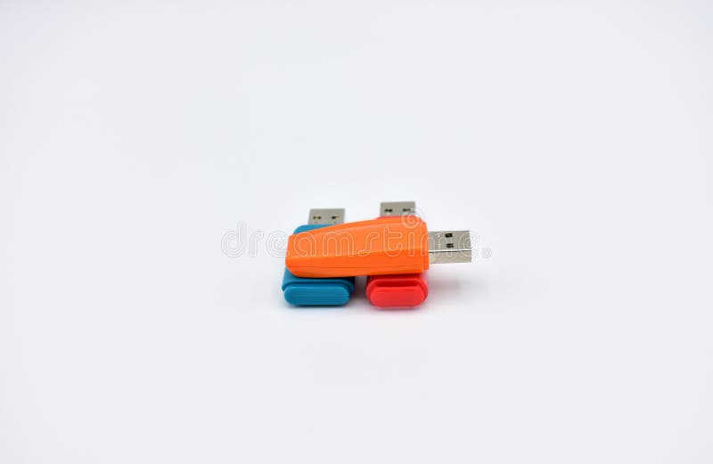 USB Flash Memory Drives with Colours, Orange, Blue and Red, on a White ...