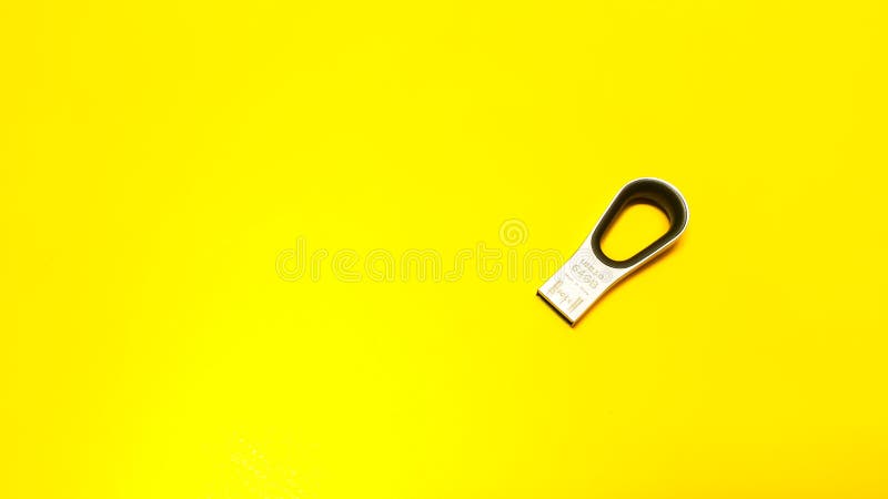 USB Flash Memory or USB Stick Isolated on Yellow Background Stock Photo ...