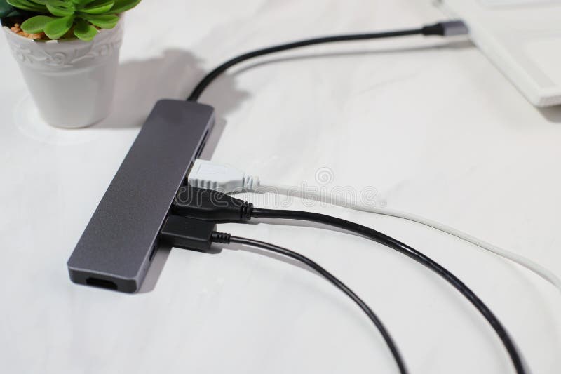 USB Hub with Cables, Multi Plug Connection, Lifestyle Stock Image ...