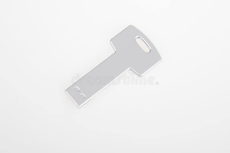 USB Key Silver Flash Drive Stick Memory on White Desk Background Stock ...