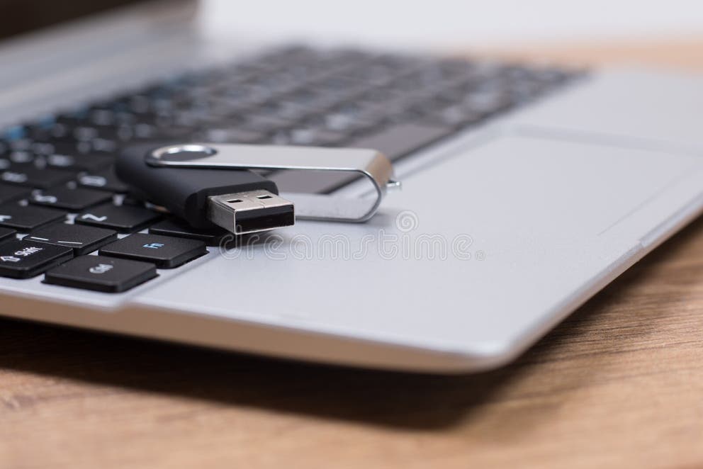 USB Memory Stick or Flash Drive on a Laptop Stock Image - Image of ...