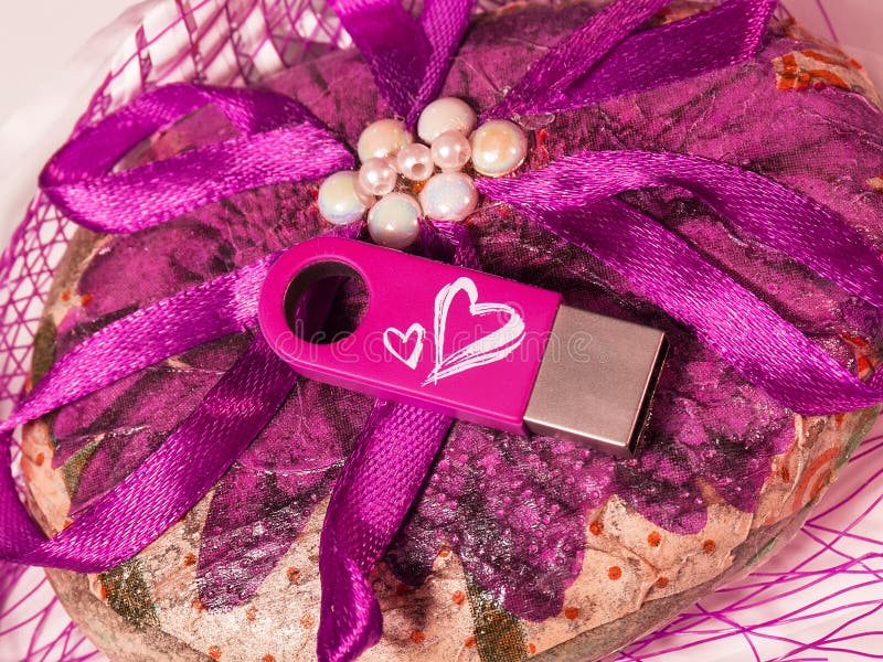 USB Pink Flash Drive with Hearts on Beautiful Figure Closeup Stock ...
