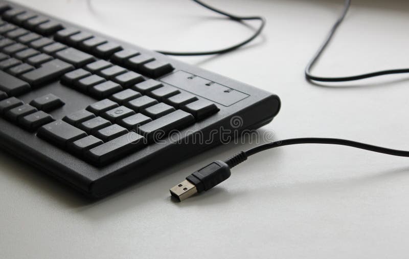 USB Plug of Wired Computer Keyboard on White Surface Stock Photo ...