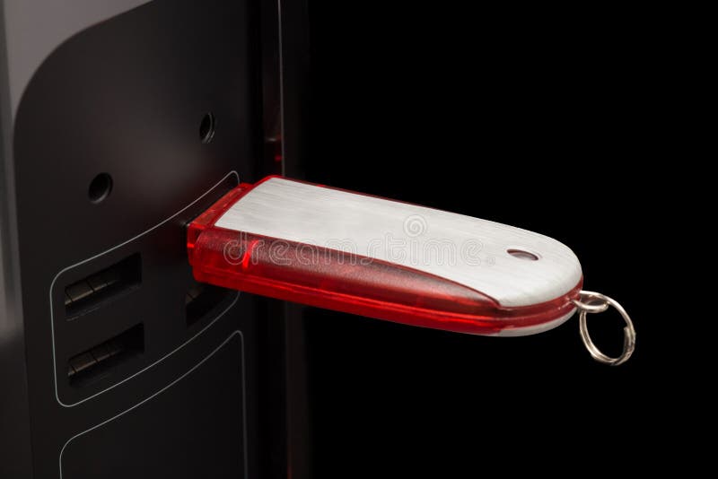 USB Red Flash Memory Connected To a Dark Computer Stock Photo - Image ...