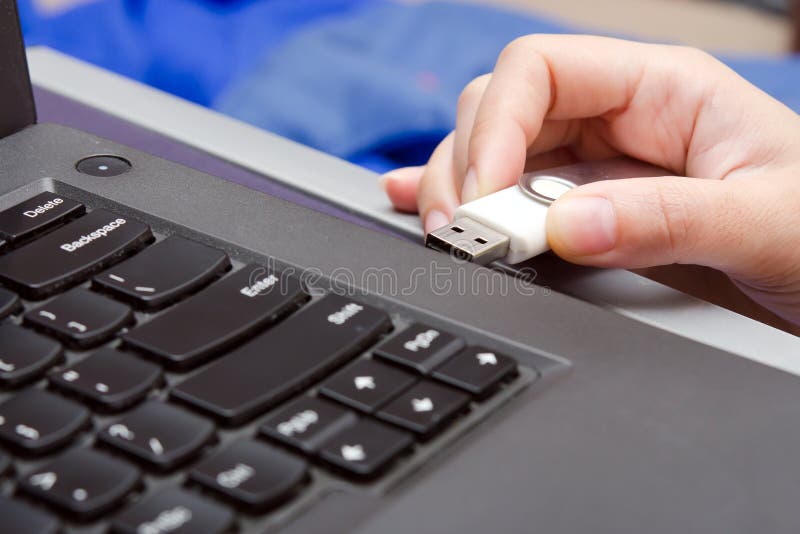 USB Stick or USB Thumb Drive with Virus Plug in To Laptop Computer Port ...