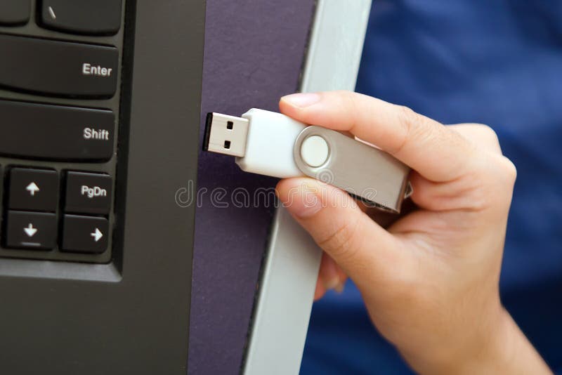 USB Stick or USB Thumb Drive with Virus Plug in To Laptop Computer Port ...