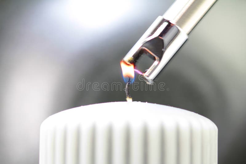 Tesla Lighter Ignites Candle Wick Stock Photo - Image of light, kindle ...