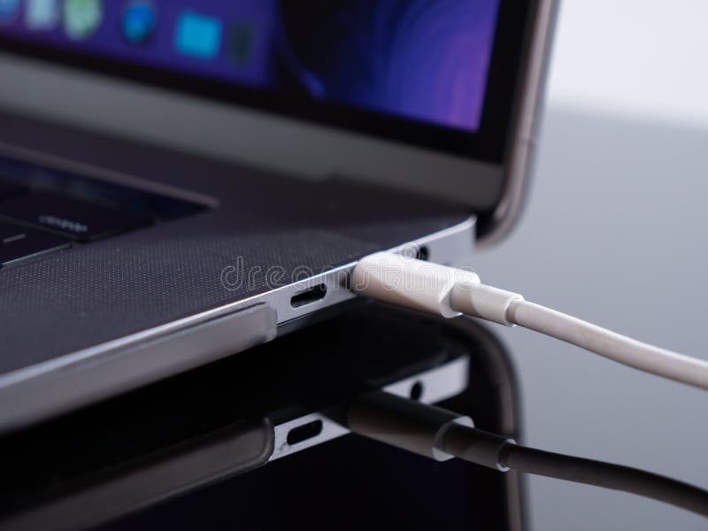USB Type C Cable Being Connected To the Laptop Computer. Fast Charging ...