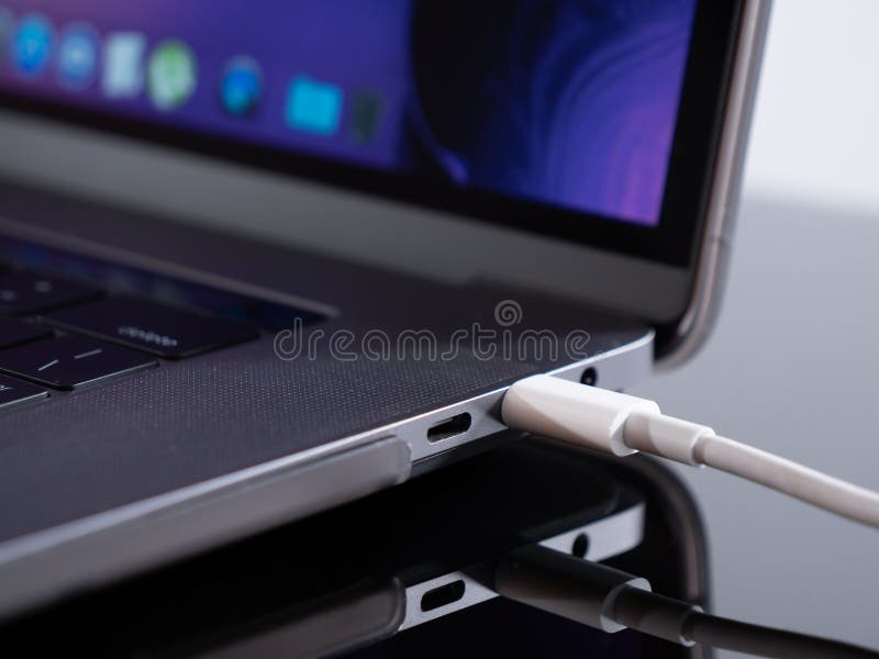 USB Type C Cable Being Connected To the Laptop Computer. Fast Charging ...