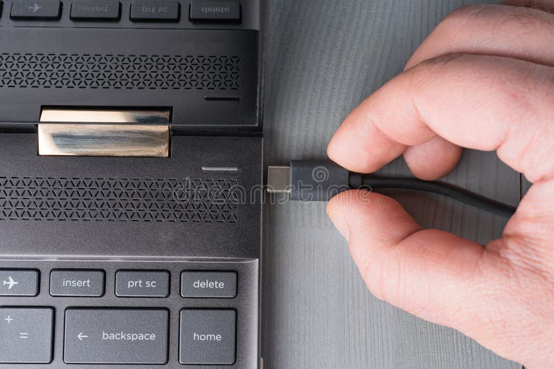 USB Type C Grey Cable Being Connected To the Laptop Stock Photo - Image ...