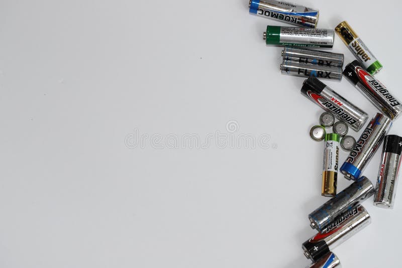 Use Finger Batteries on a White Background As a Background with Space ...