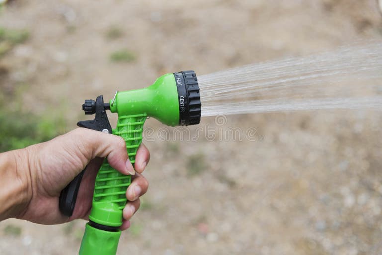 Plastic Trigger Nozzle for Spray the Water To the Tree Stock Image ...