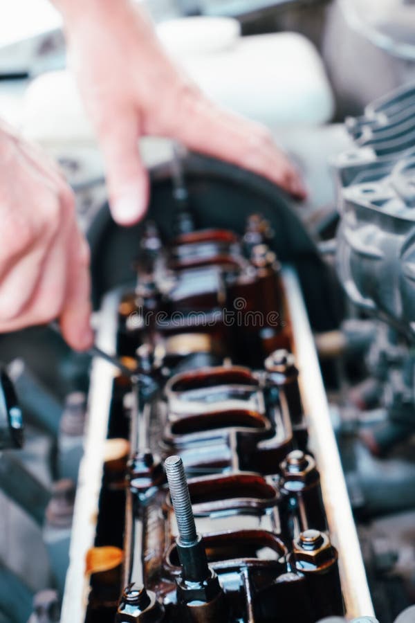 Car Repair. the Use of Poor Quality Oil in the Engine. Deposits of Tar ...