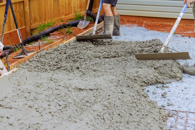 Use of Special Tools by a Construction Worker in Leveling Concrete ...