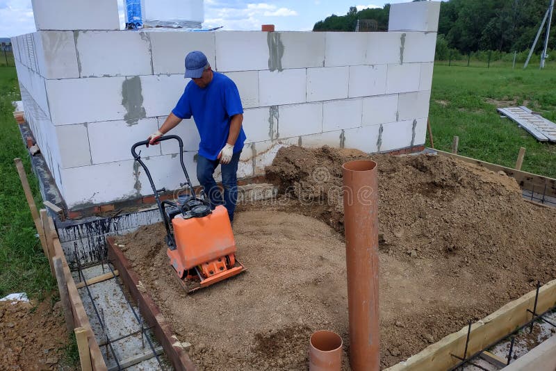 Use of a Vibrating Plate on Construction, Heavy Construction Tools and ...