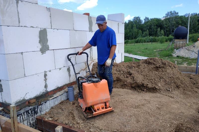 Use of a Vibrating Plate on Construction, Heavy Construction Tools and ...