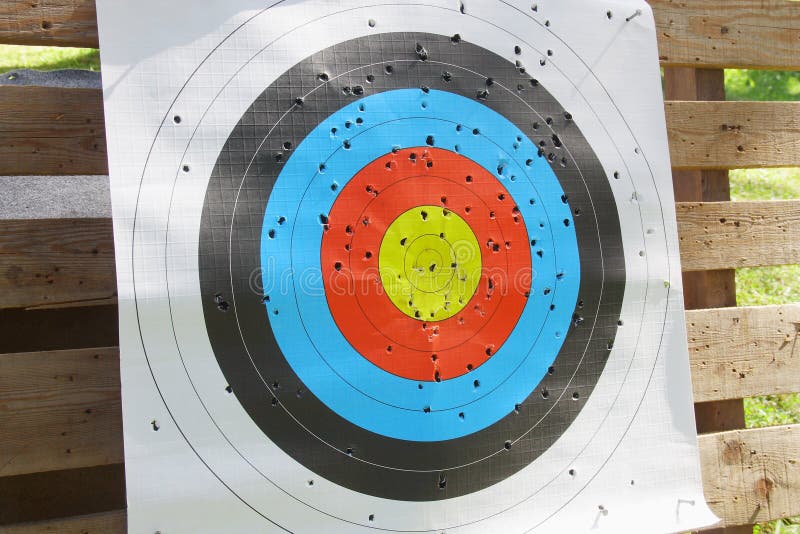 Used Archery Target on a Wooden Base Stock Photo - Image of precision ...