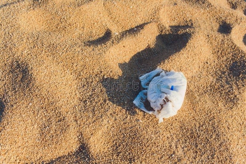 Used Baby Diaper Left Unattended at the Beach. Stock Image - Image of ...