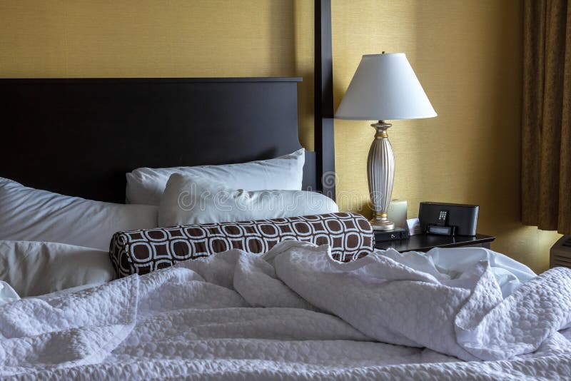 Used Bed with a Little Table Stock Image - Image of bedroom, business ...