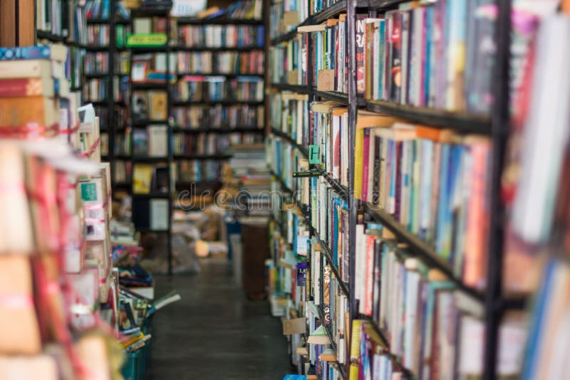 Used book shelf in library stock photo. Image of knowledge - 104850138