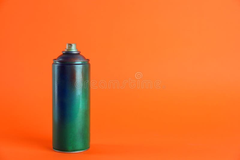 Used Can of Spray Paint on Orange Background. Space for Text Stock ...