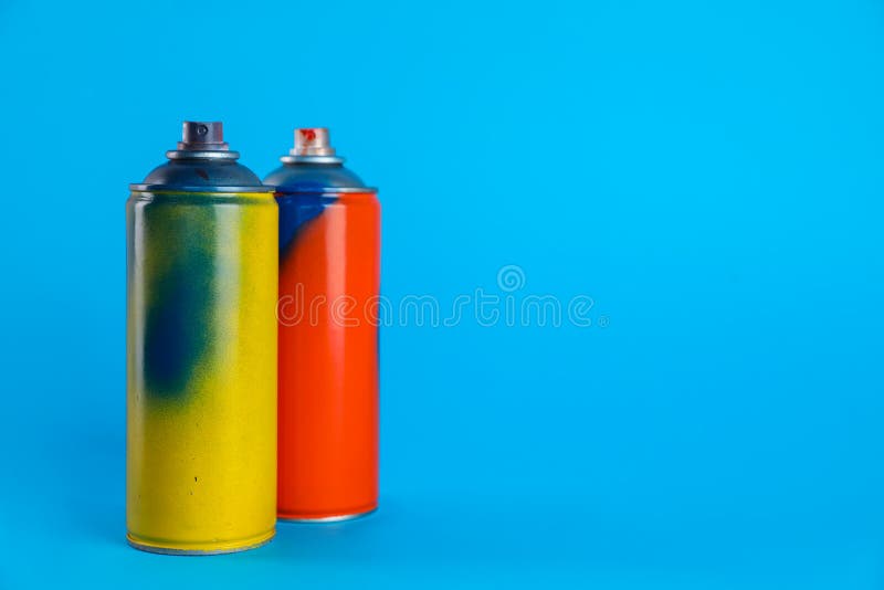 Used Cans of Spray Paints on Light Blue Background. Space for Text ...