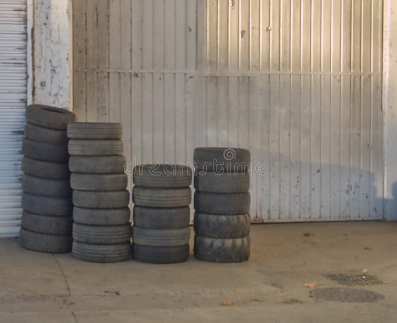 Used Car Wheels Stacked for Recycling Stock Photo - Image of recycle ...