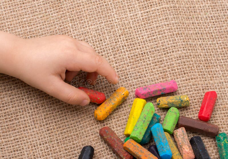 Used Color Crayons and a Toddlers Hand Stock Photo - Image of ...