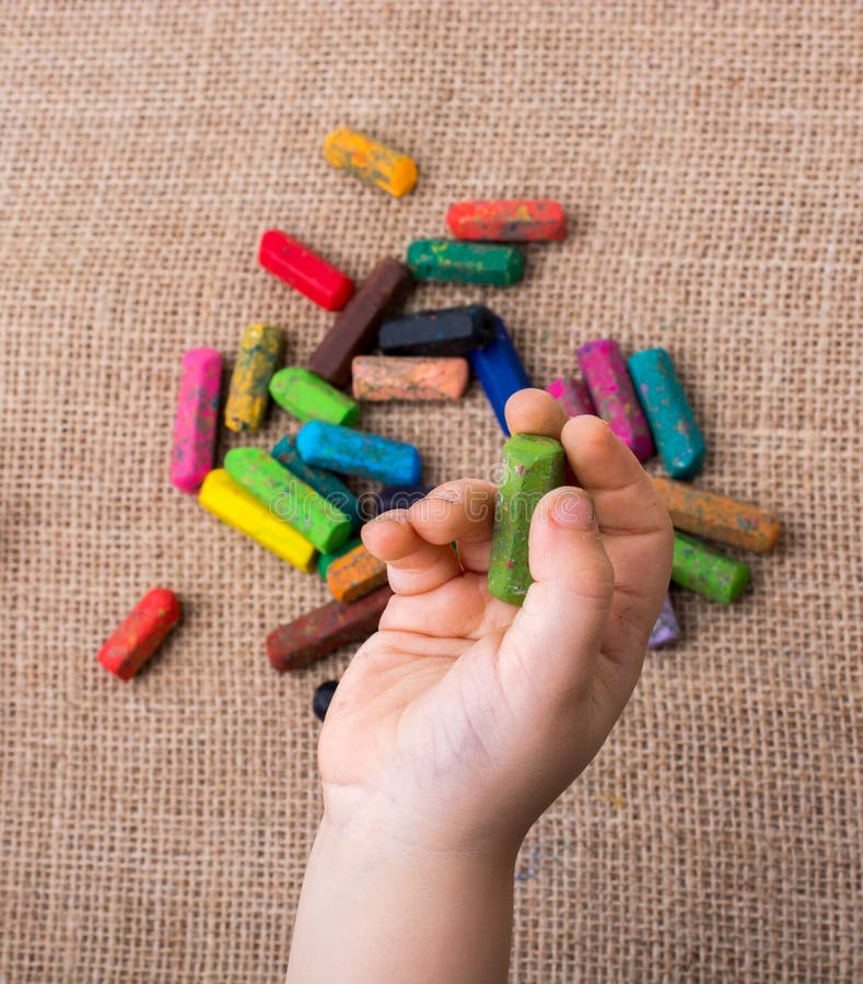 Used Color Crayons and a Toddlers Hand Stock Photo - Image of crayon ...