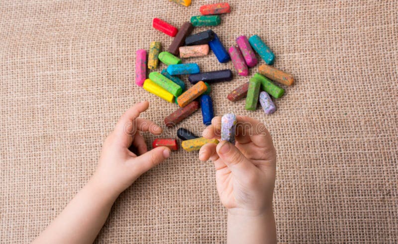 Used Color Crayons and a Toddlers Hand Stock Image - Image of color ...