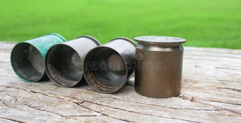 Used Copper Empty Bullet Shells on Wood Plank Stock Photo - Image of ...