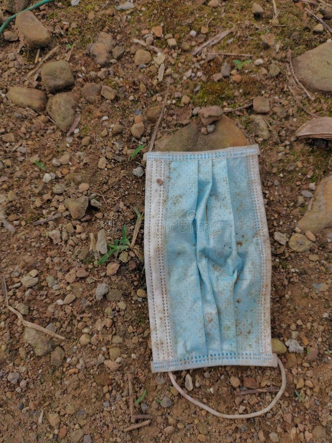 Used Discarded Mask on the Ground Stock Image - Image of asphalt ...